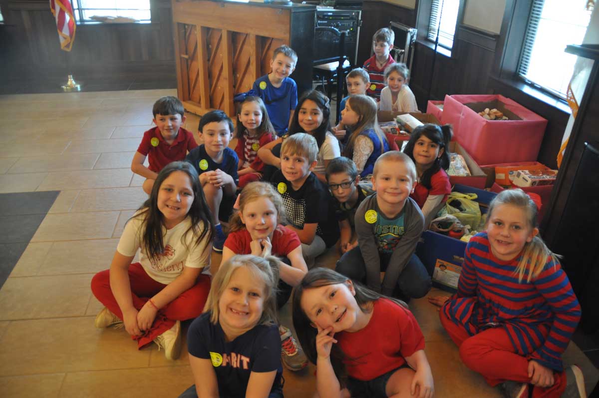 Celebrating veterans: First graders perform for those who sacrificed ...